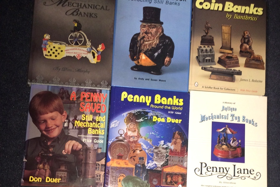 Cast Iron Banks - AntiqueToys.com - Antique Toys for Sale